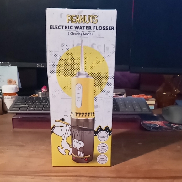 Peanuts | Bath | Peanuts Yellow Electric Water Flosser | Poshmark